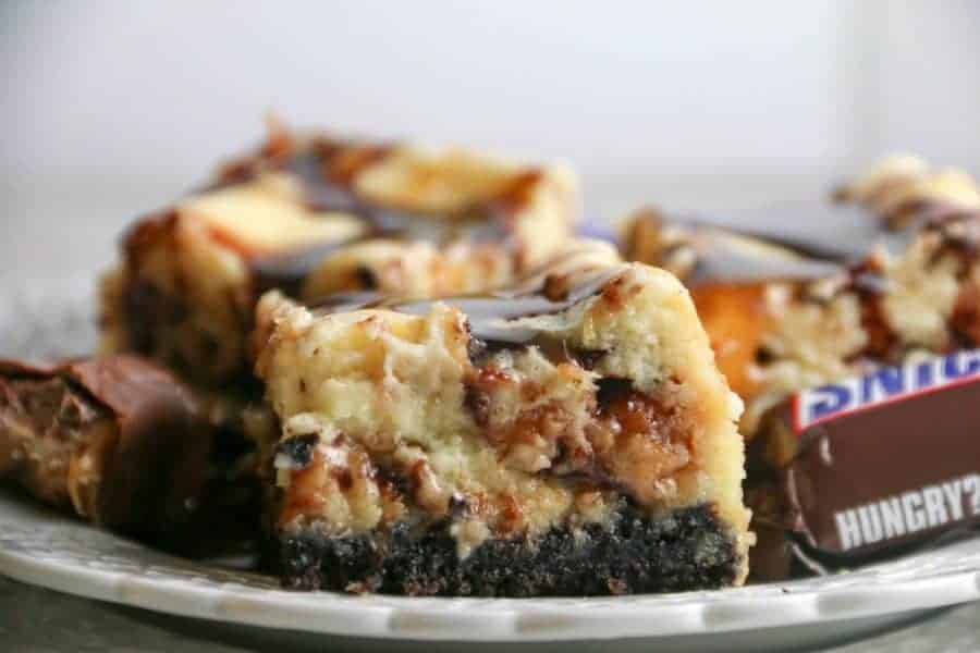 Snickers Cheesecake Bars - Boston Girl Bakes
