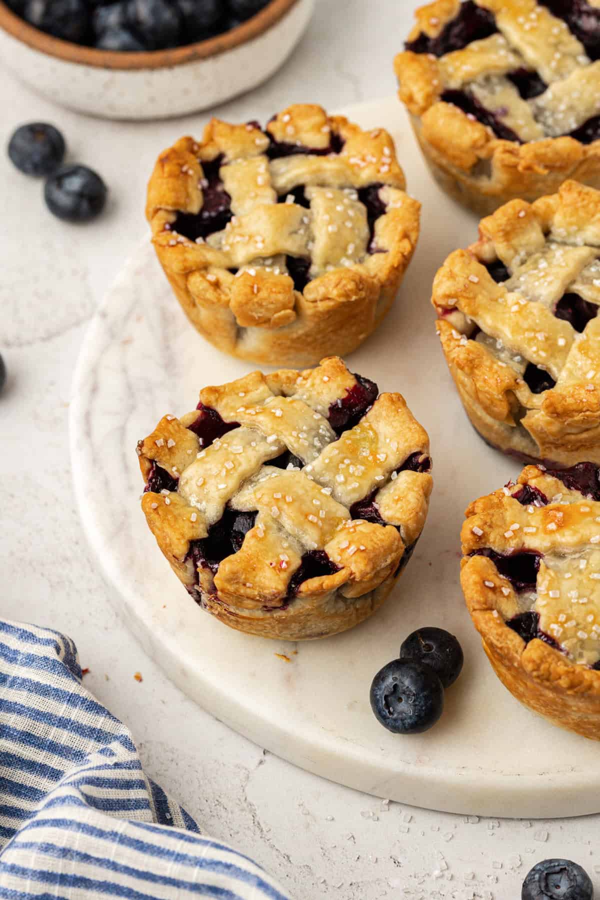 Easy Mini Blueberry Pies Recipe (Made In Muffin Tin!)